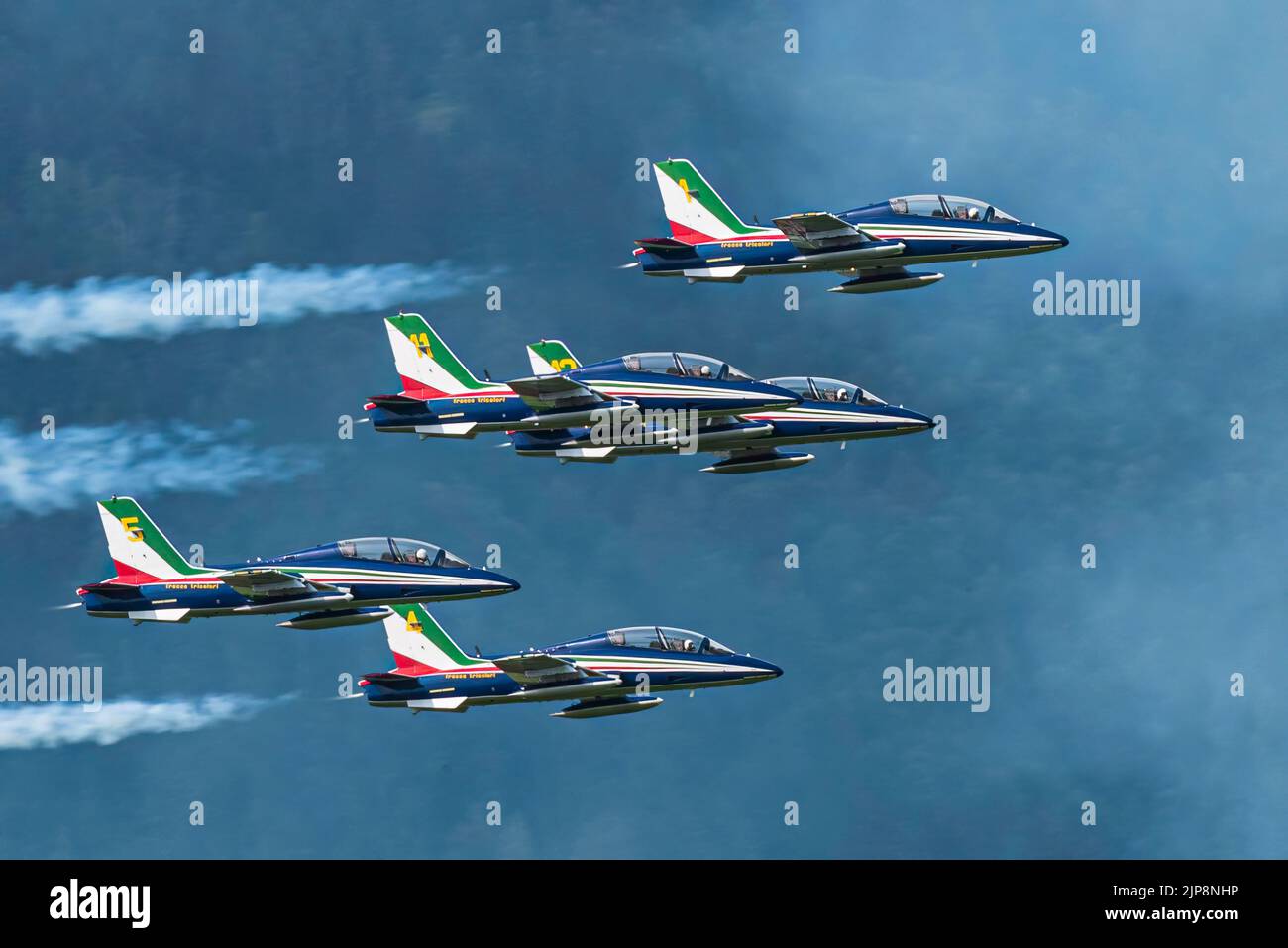 A closeup of the military air force flying in a blue sky Stock Photo ...