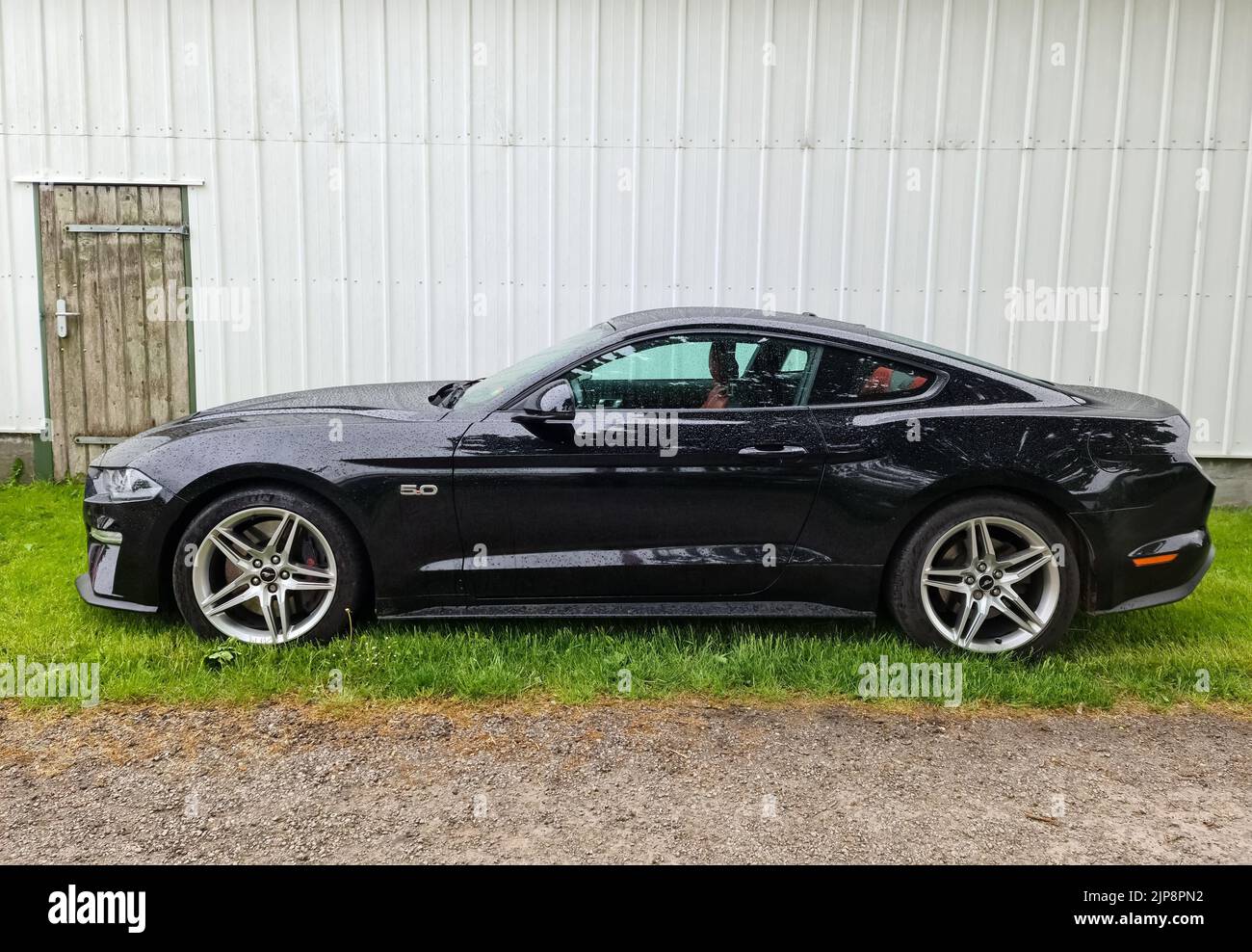 A modern black Ford Mustang car Stock Photo - Alamy
