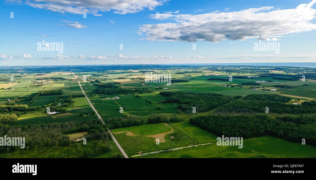 Wisconsin farmlands and roads with Lake Winnebago shore in the far ...