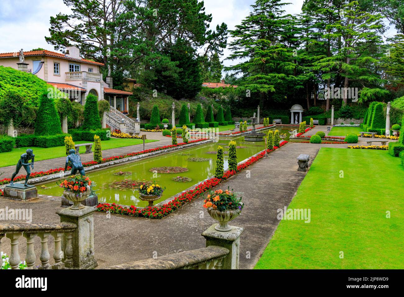 Colourful planting in front of the Italian Villa façade in the Italian ...