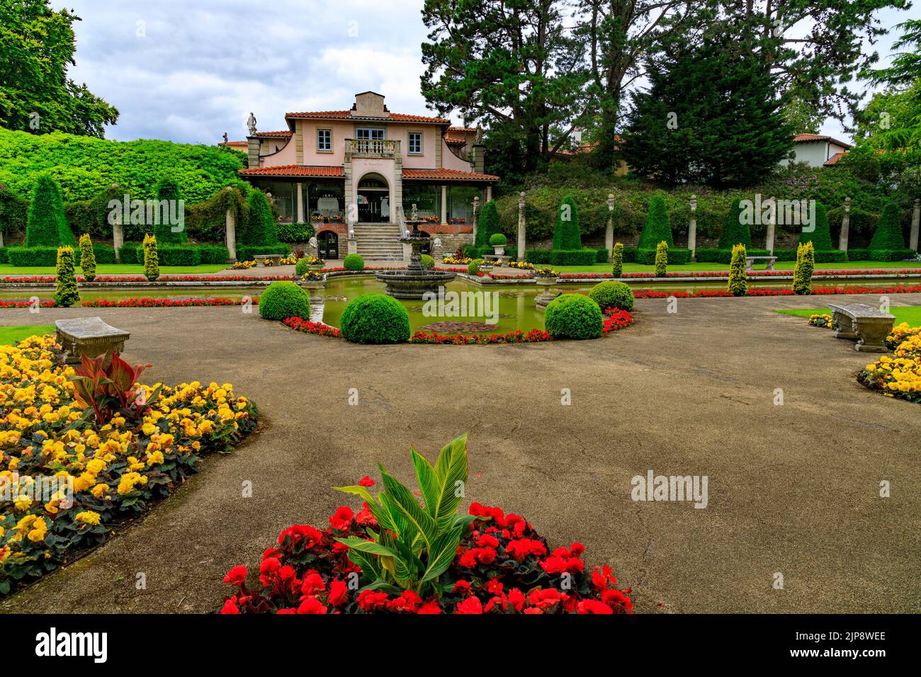 Colourful planting in front of the Italian Villa façade in the Italian ...
