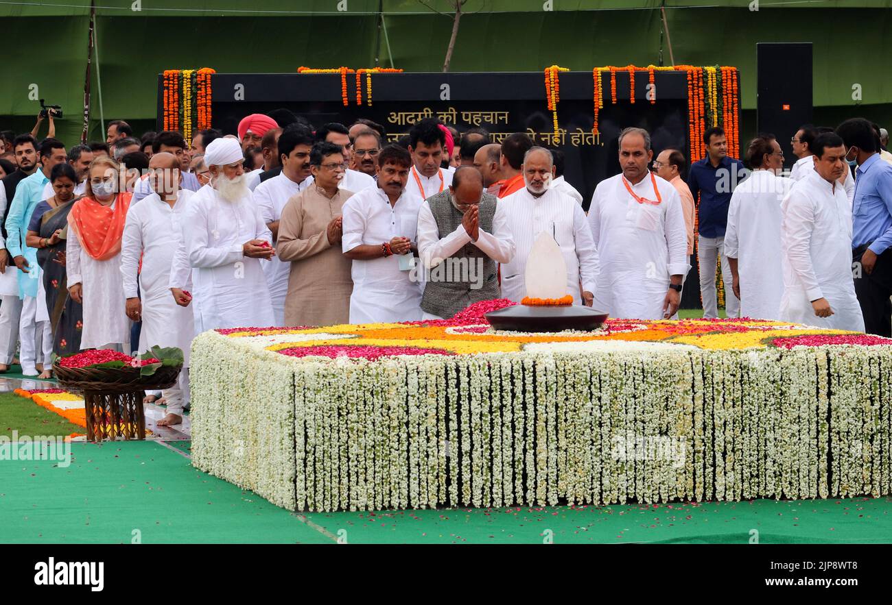 Bharatiya Janata Party leaders and workers pay floral tribute to the ...