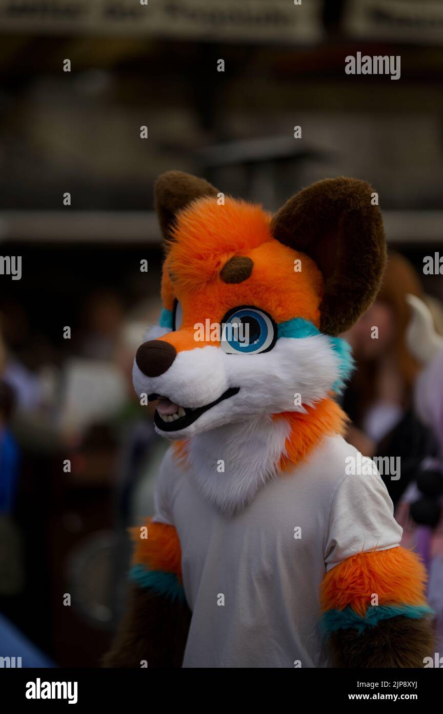 A vertical closeup of a person in a fursuit on Japan day in Dusseldorf ...