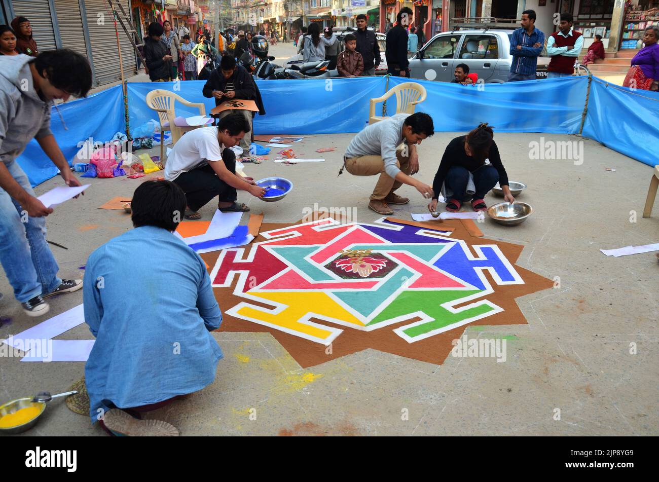 Nepalese drawing made rangoli symbol from powder or sand paint color ...