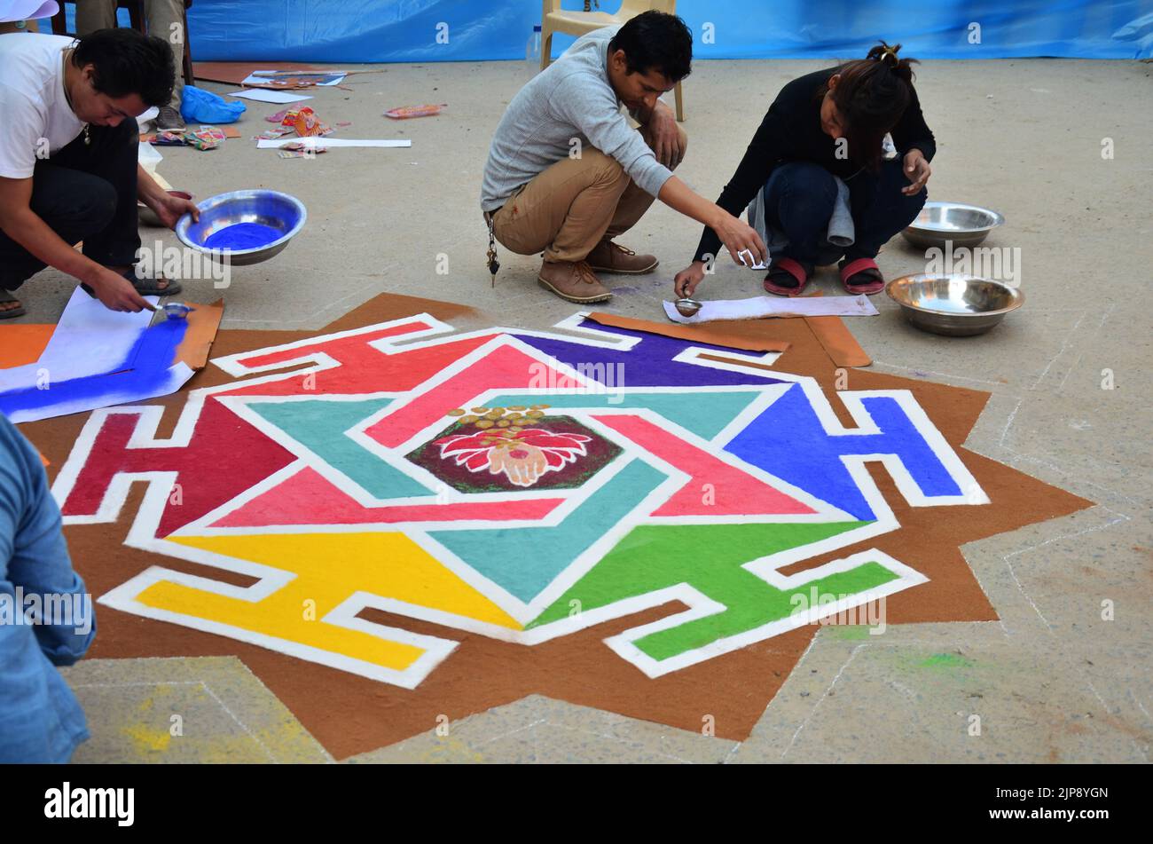 Nepalese drawing made rangoli symbol from powder or sand paint color ...