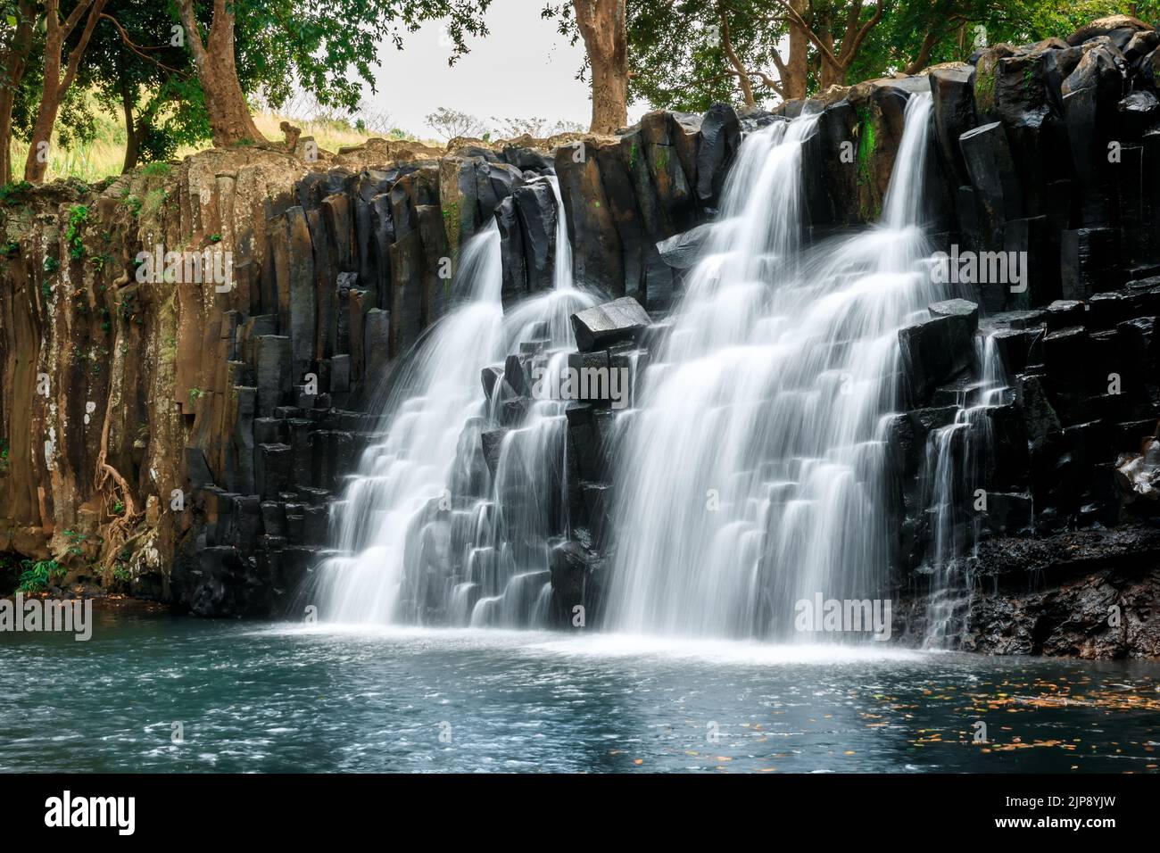 Scenic cascade waterfall with amazing rocks in Mauritius island Stock ...