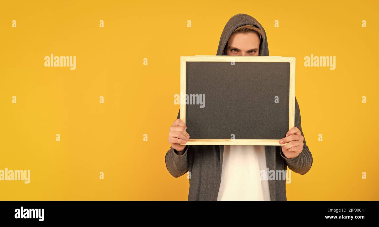 male behind chalkboard. place for useful information. advertisement ...