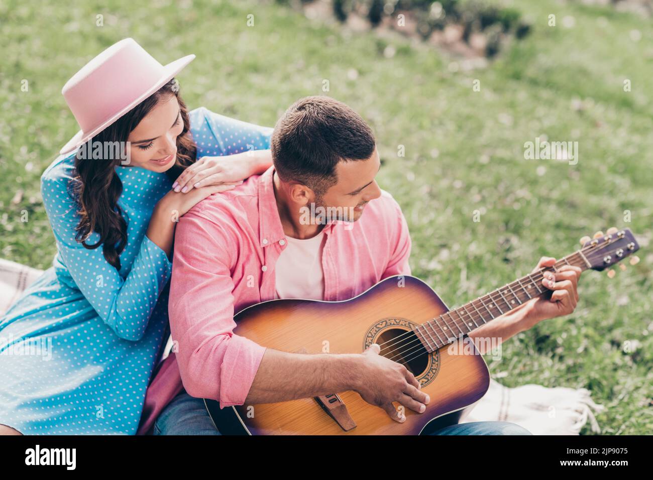 Photo of shiny cute two people together wear casual outfits playing ...