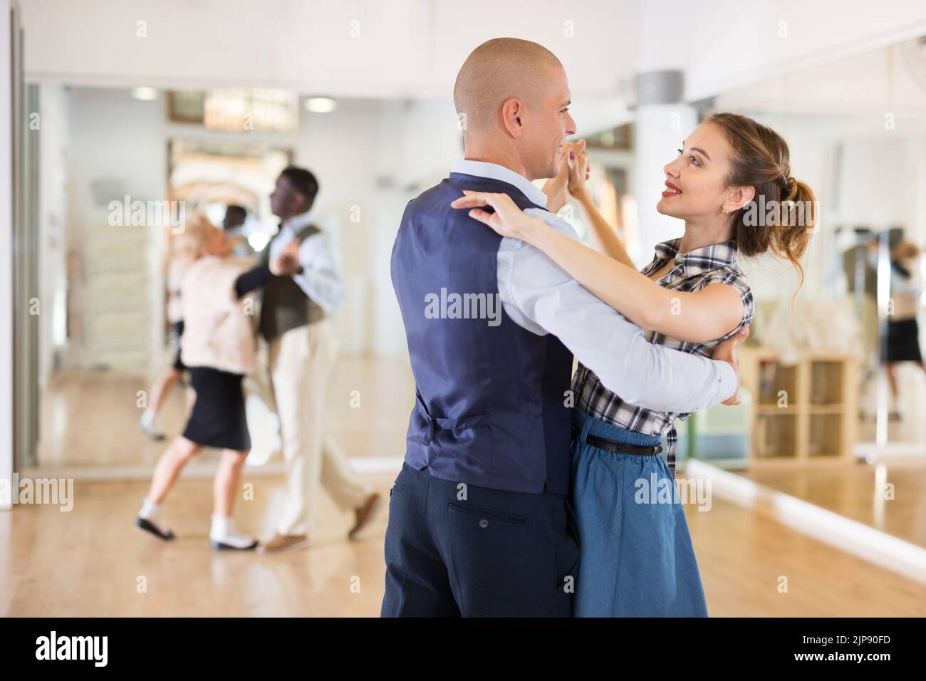 Man and woman learning to dance classical ballroom dance Stock Photo ...