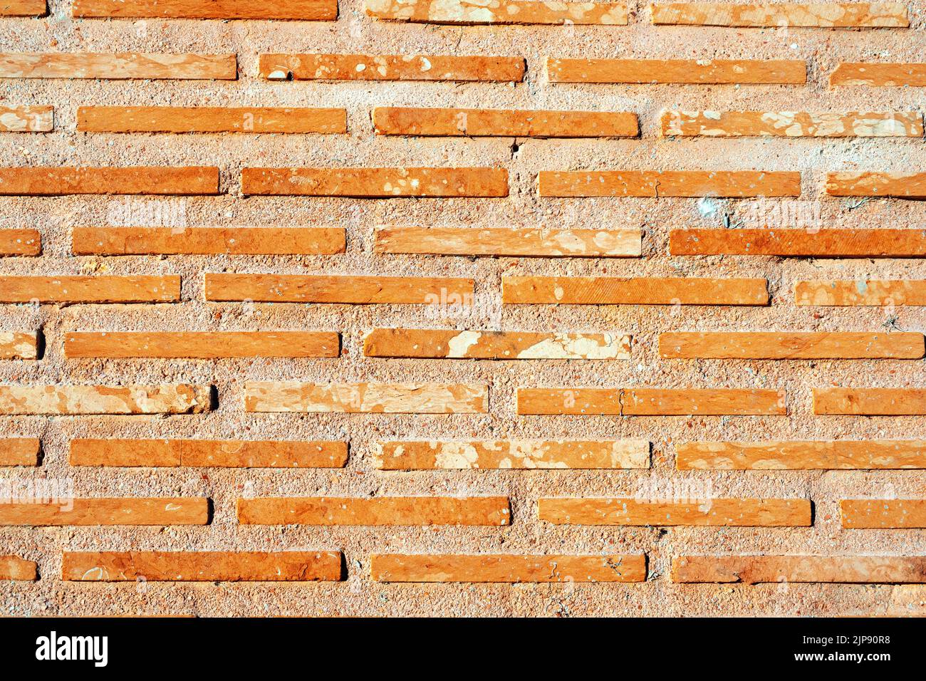 Outdoor brick wall made from narrow long bricks Stock Photo - Alamy