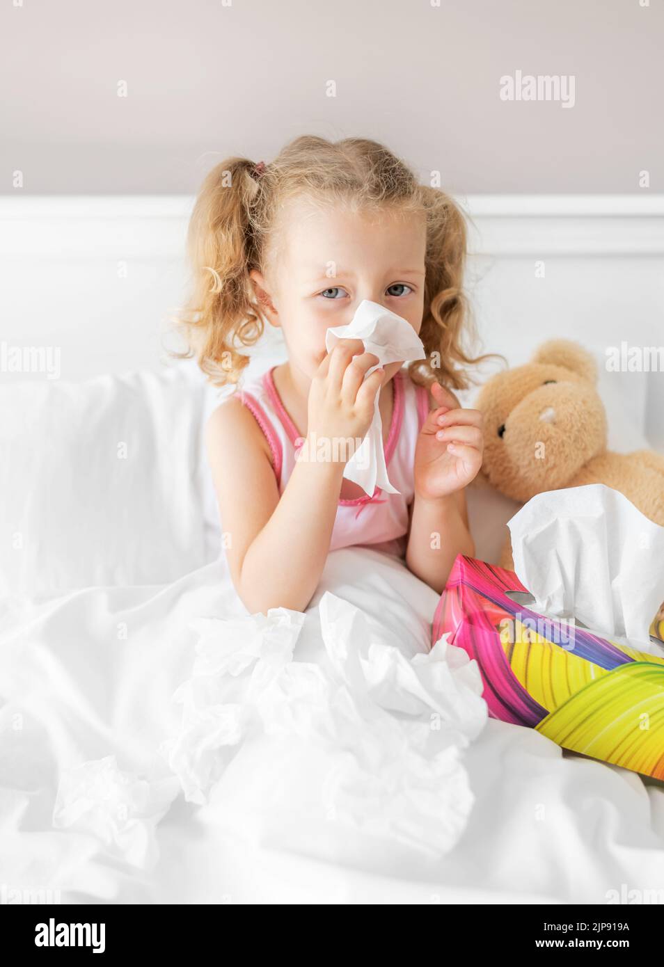 The child himself blows snot into a napkin Stock Photo - Alamy