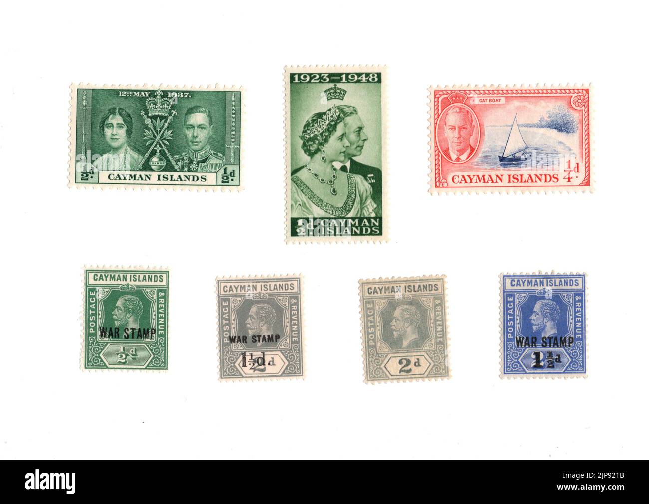 A selection of old mint postage stamps from the Cayman Islands on a ... A selection of old mint postage stamps from the Cayman Islands on a ...