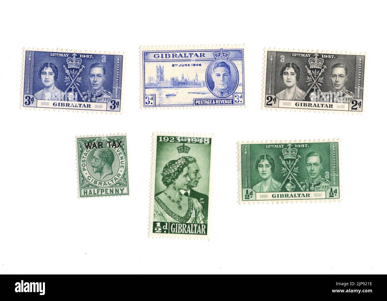 A selection of old mint postage stamps from Gibraltar on a white ... A selection of old mint postage stamps from Gibraltar on a white ...