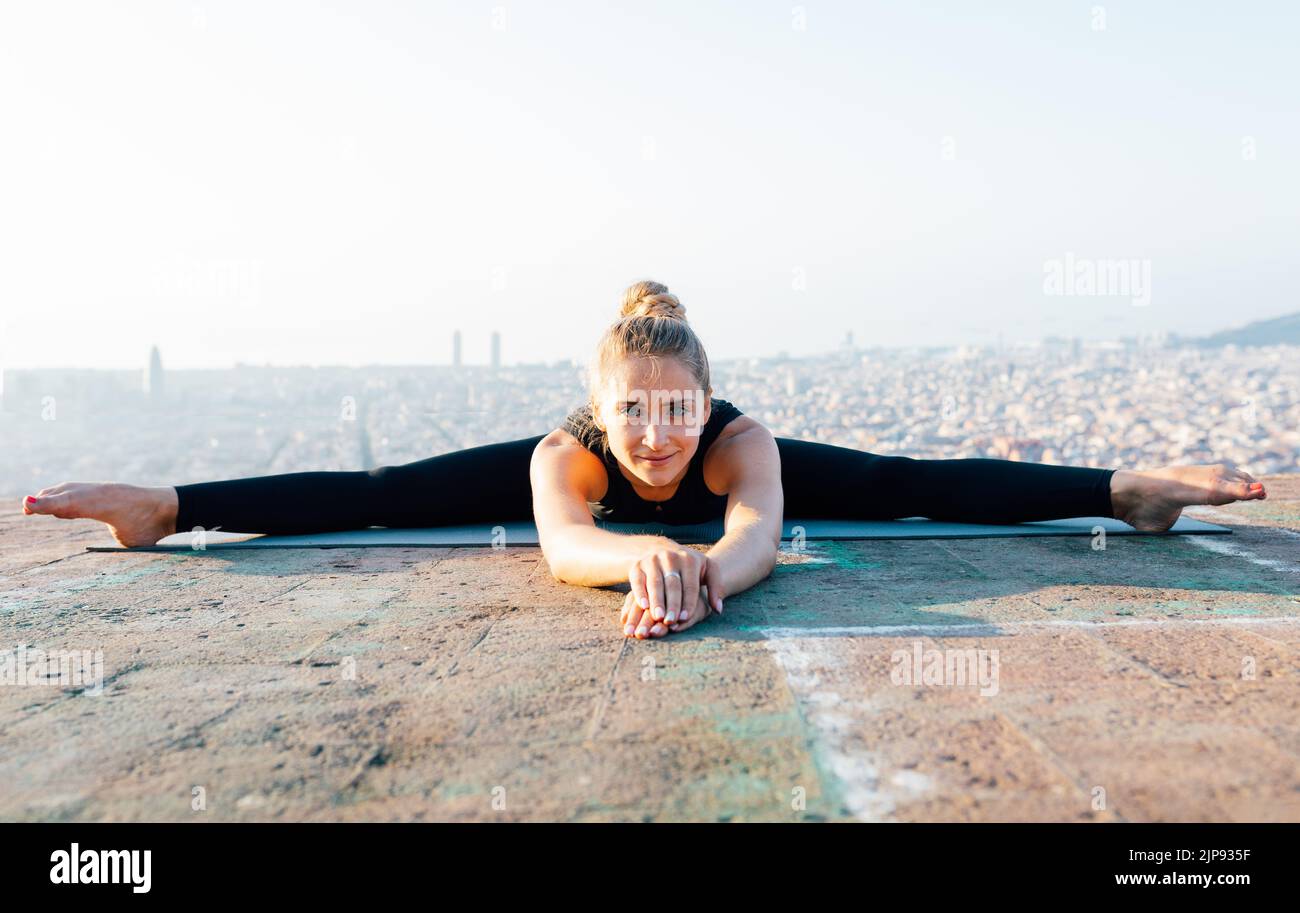 young woman, yoga, stretching, outdoor yoga, upavishta konasana, girl ...