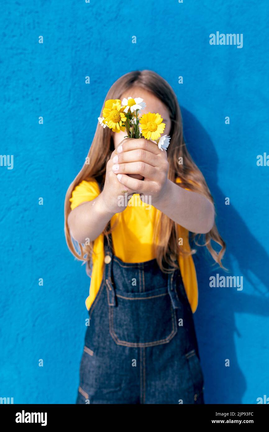 Boy boys male kids children flower hi-res stock photography and images ...