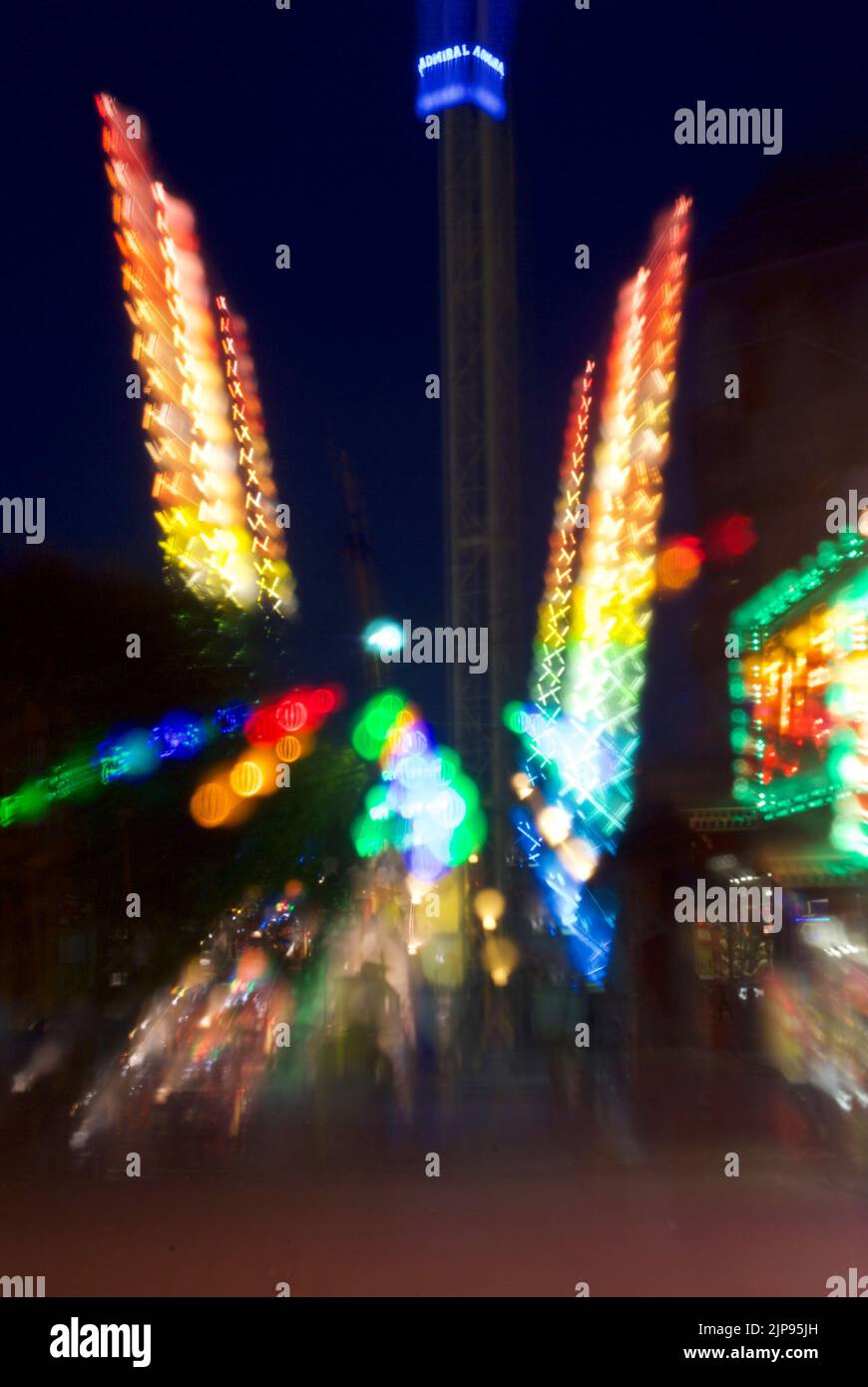 A vertical long exposure shot of bokeh lights of prater Stock Photo - Alamy