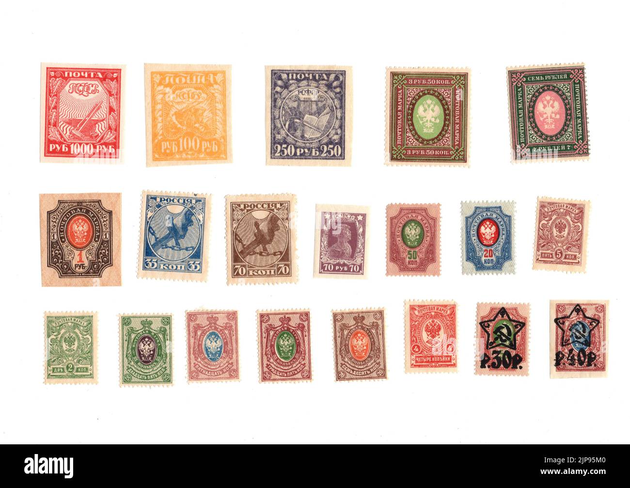 A selection of old mint postage stamps from CCCP and USSR on a white ... A selection of old mint postage stamps from CCCP and USSR on a white ...