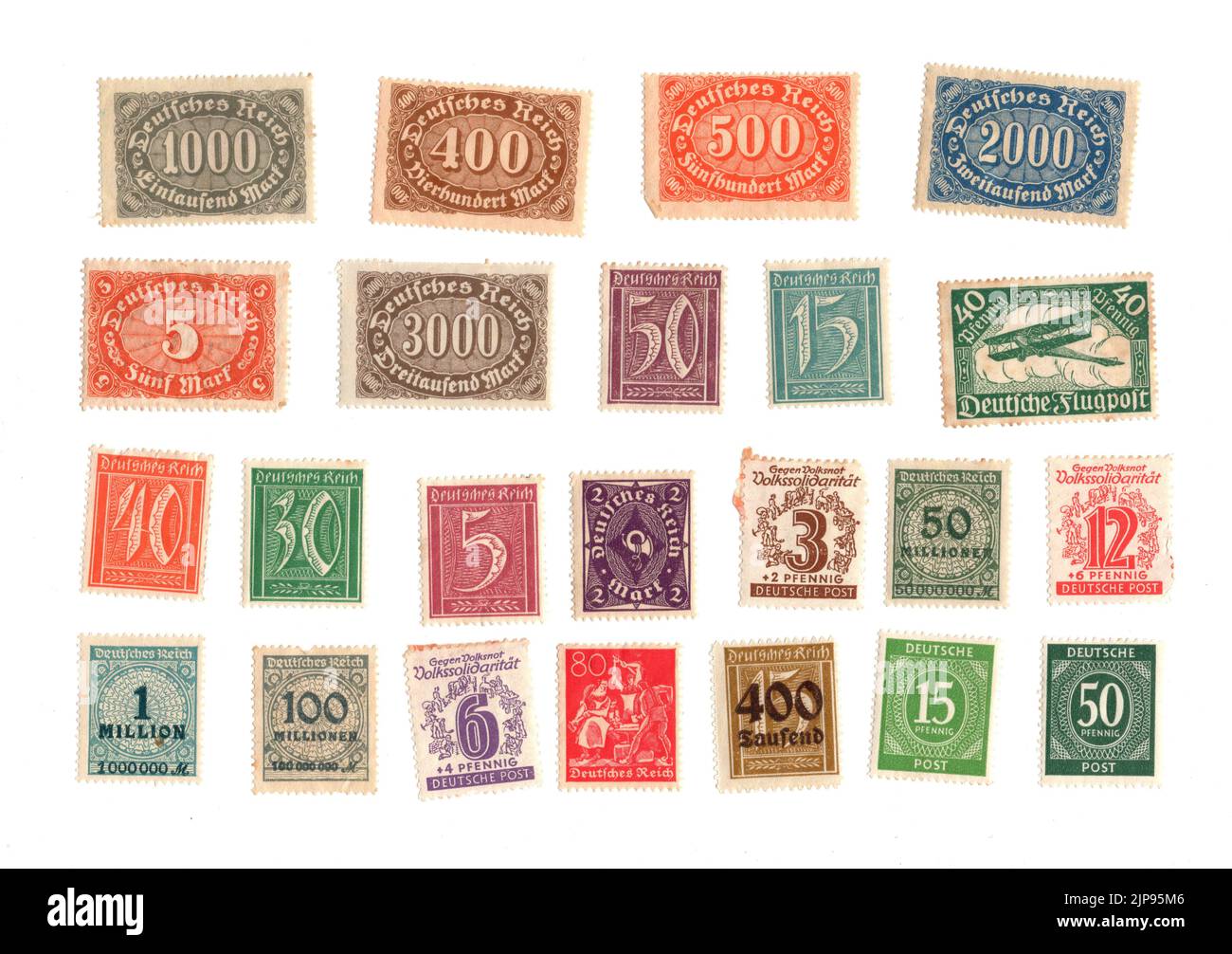 A selection of old mint postage stamps from Germany on a white ... A selection of old mint postage stamps from Germany on a white ...