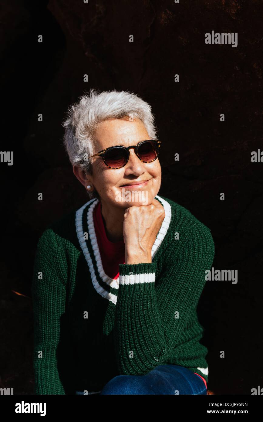 Woman wears gray sweater hi-res stock photography and images - Alamy