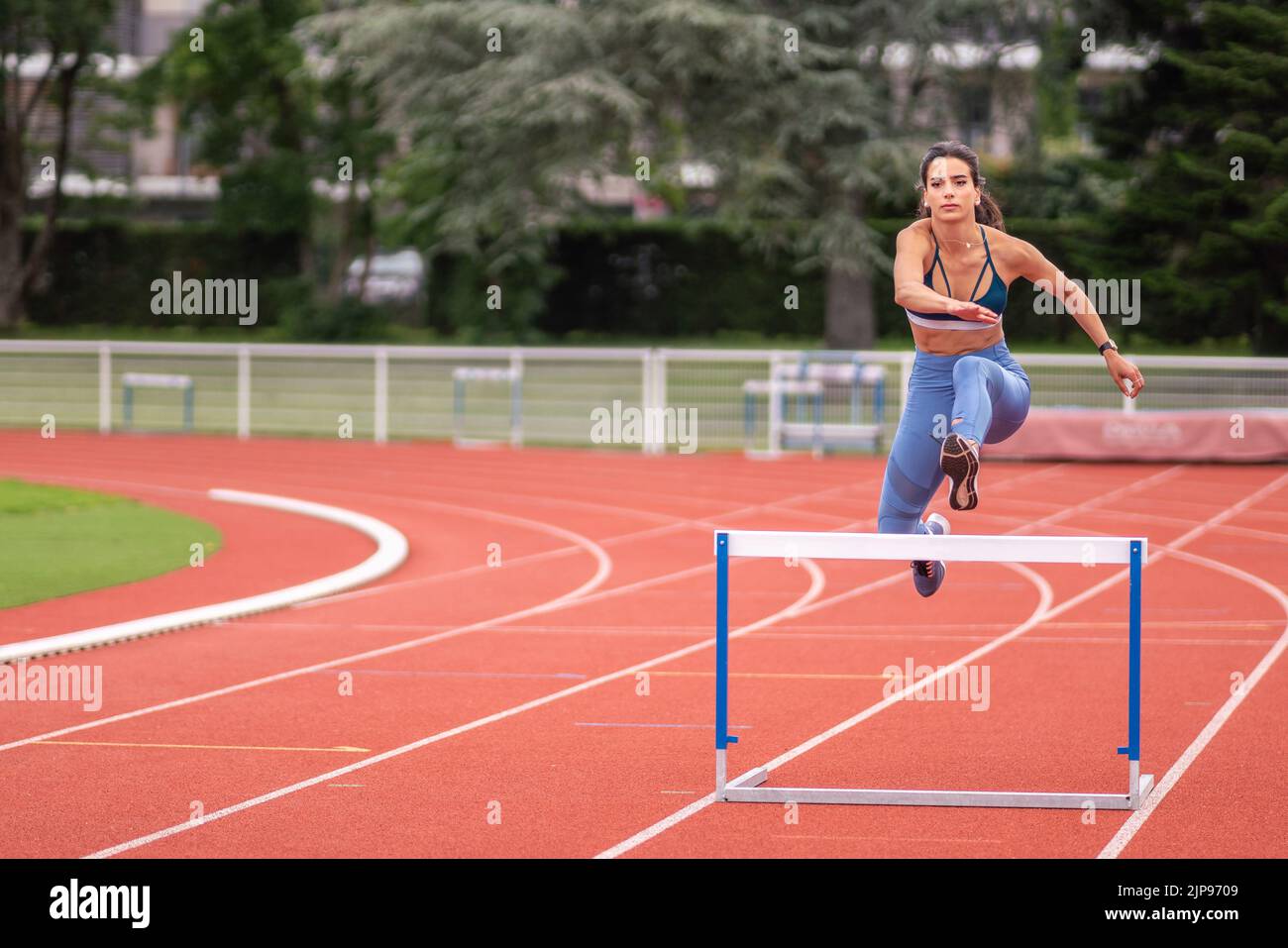 Person hurdling hi-res stock photography and images - Alamy