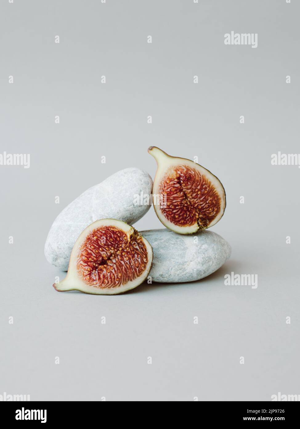 Ripe figs on a grey background. Minimal concept. place for text Stock ...