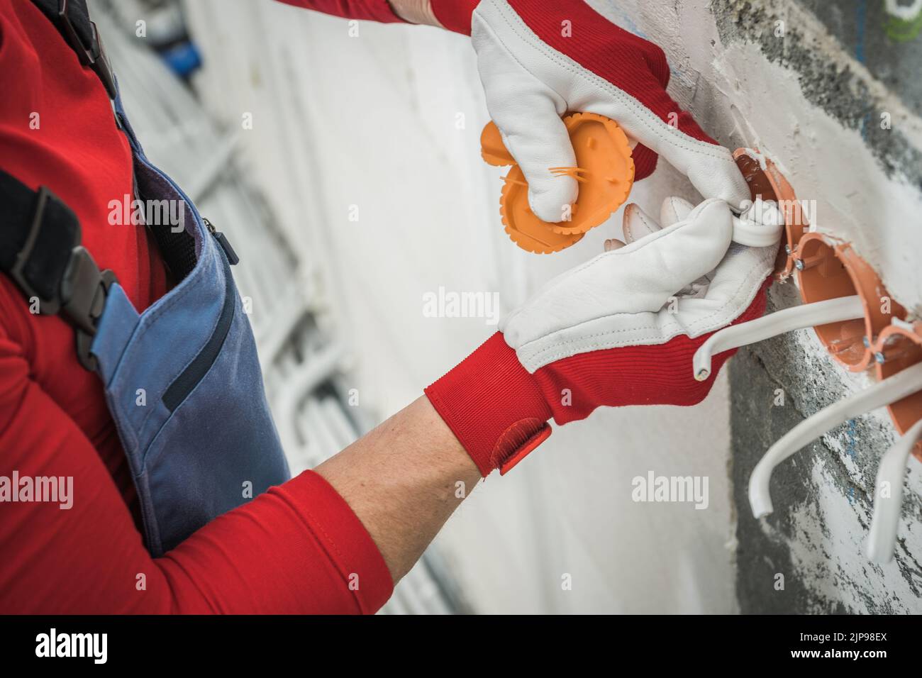 Closeup of Electrical System Power Sockets Being Installed in the Wall ...