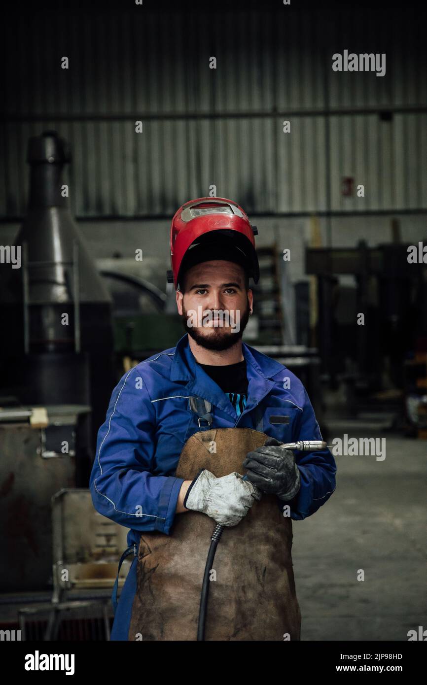 workplace, workshop, welder, welding helmet, arbeitsporträt ...