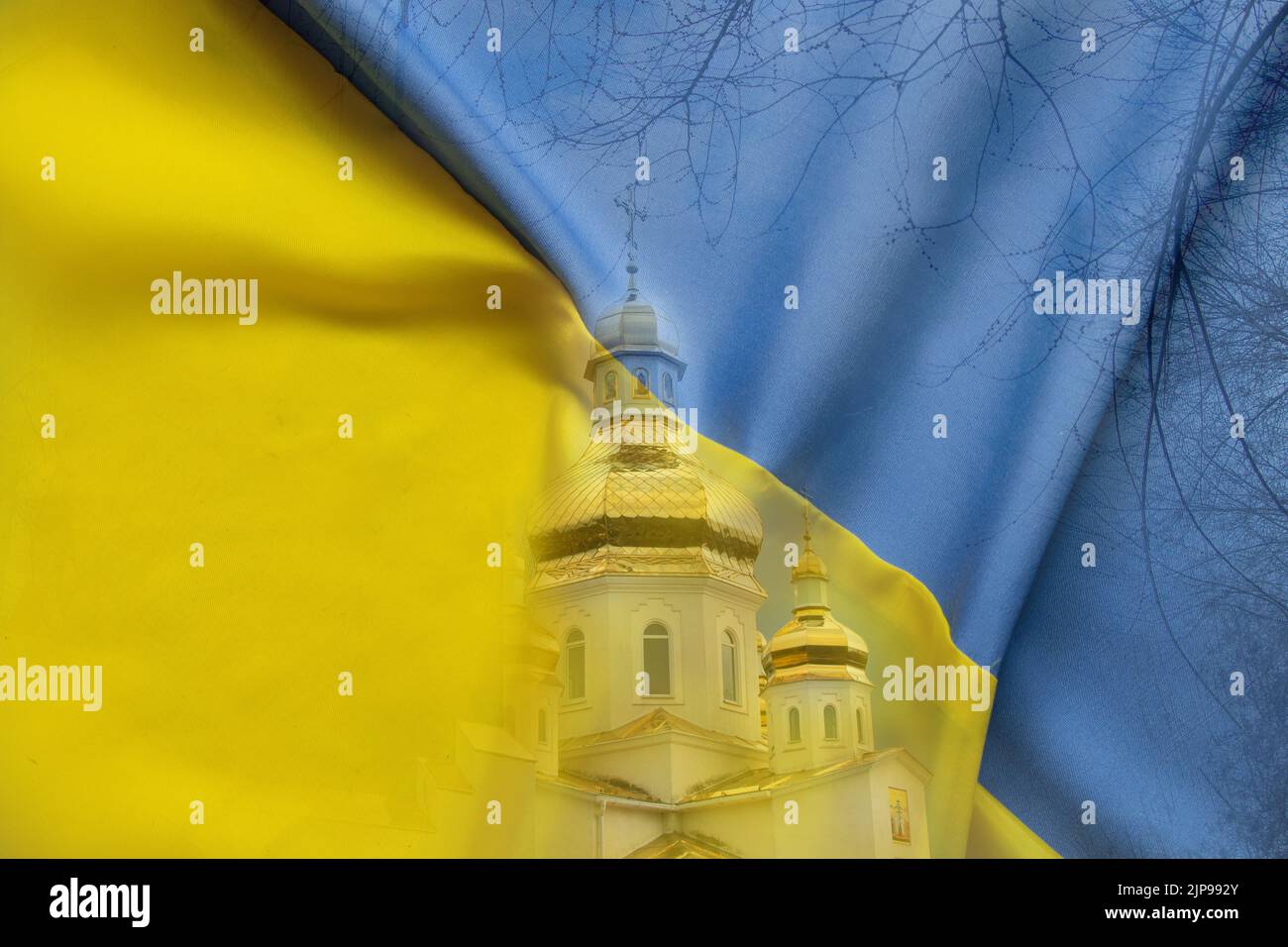 The national flag of Ukraine is yellow-blue against the background of ...