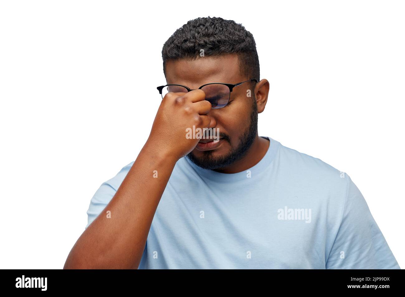tired african man in lasses touching nose bridge Stock Photo - Alamy