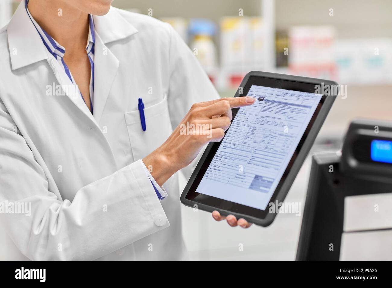 Pharmacist prescription on tablet hi-res stock photography and images ...