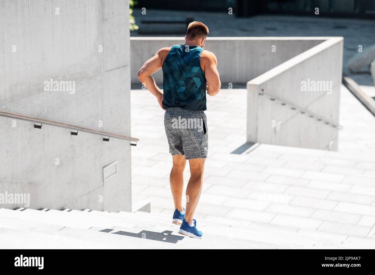 Man running downstairs hi-res stock photography and images - Alamy