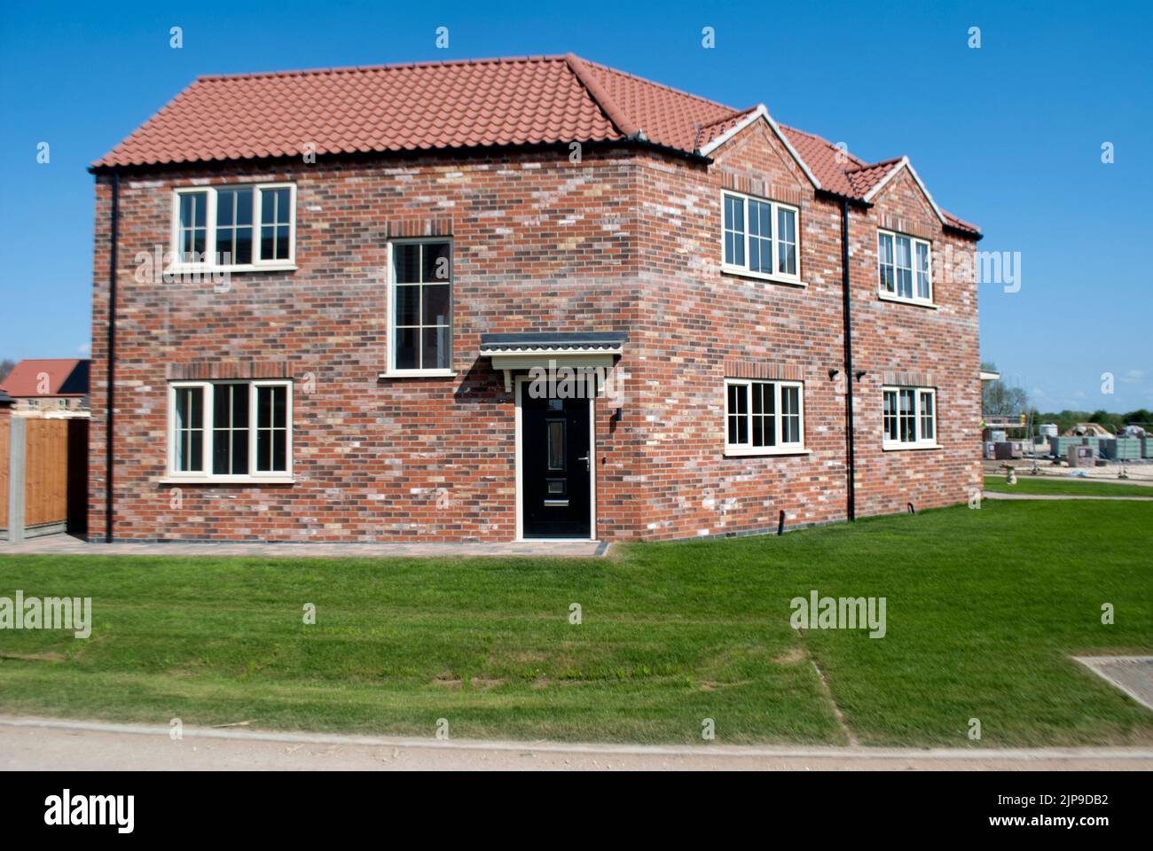 Newly constructed houses building site Stock Photo - Alamy