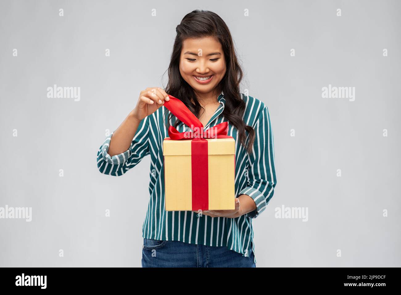 Woman opening beautiful gift box hi-res stock photography and images ...
