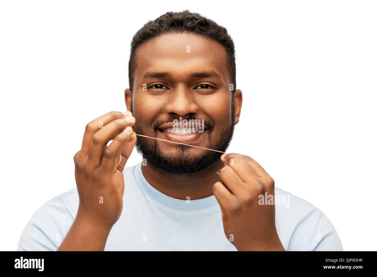 happy african man with dental floss cleaning teeth Stock Photo - Alamy