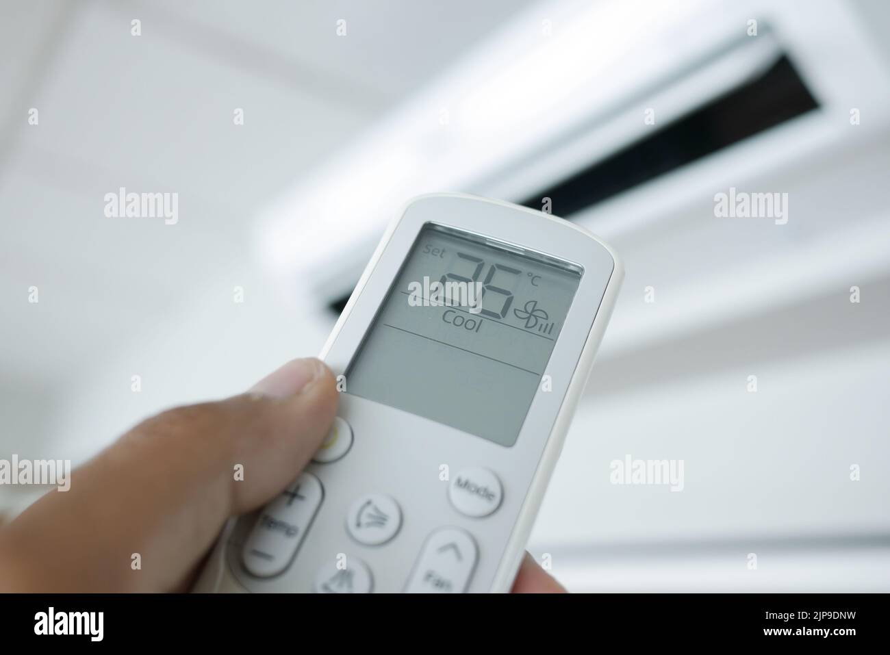 Hand operating remote control hi-res stock photography and images - Alamy