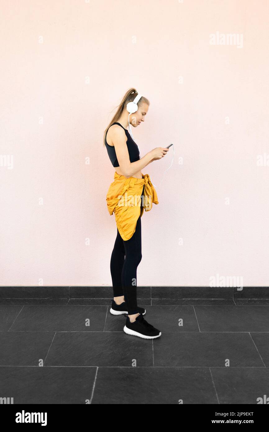 mobile communication, sportswoman, listening music, mobile ...