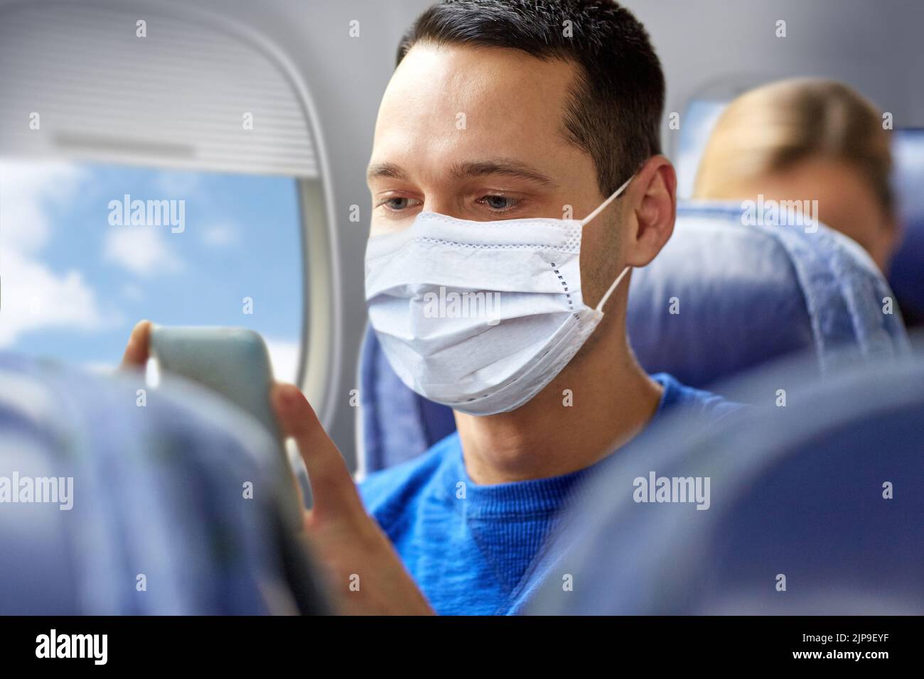 Mask plane passenger hi-res stock photography and images - Alamy