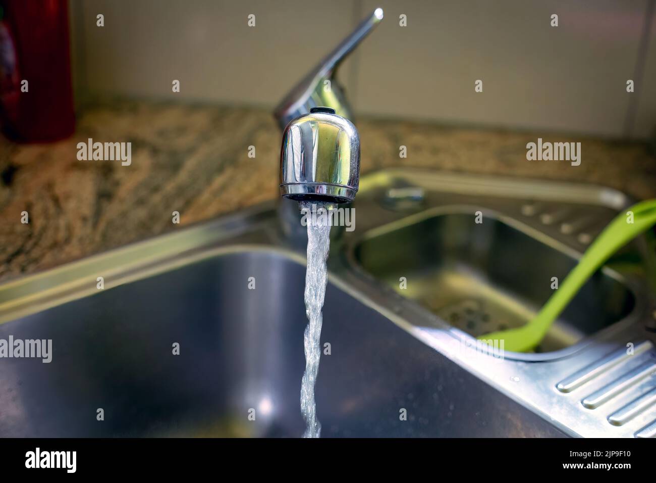 Wasting water kitchen hi-res stock photography and images - Alamy