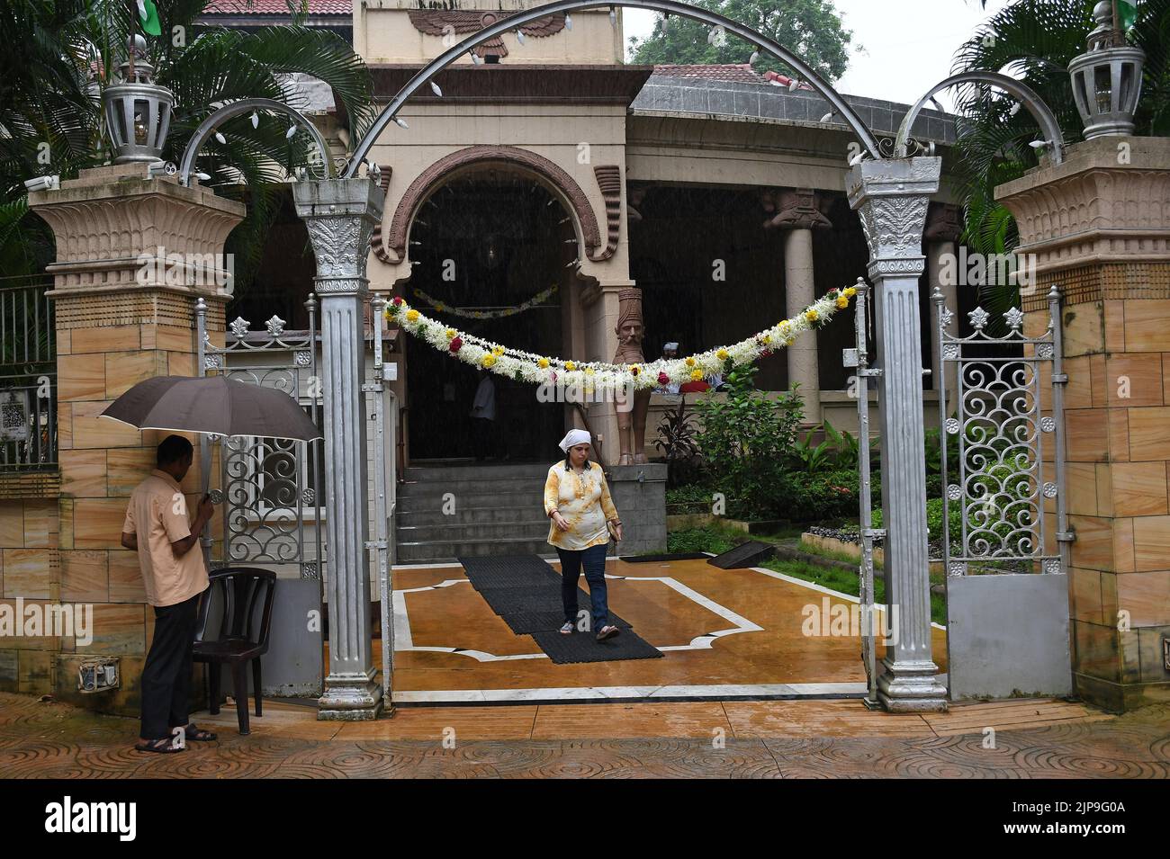 Mumbai, India. 16th Aug, 2022. A Parsi woman seen coming out of the ...