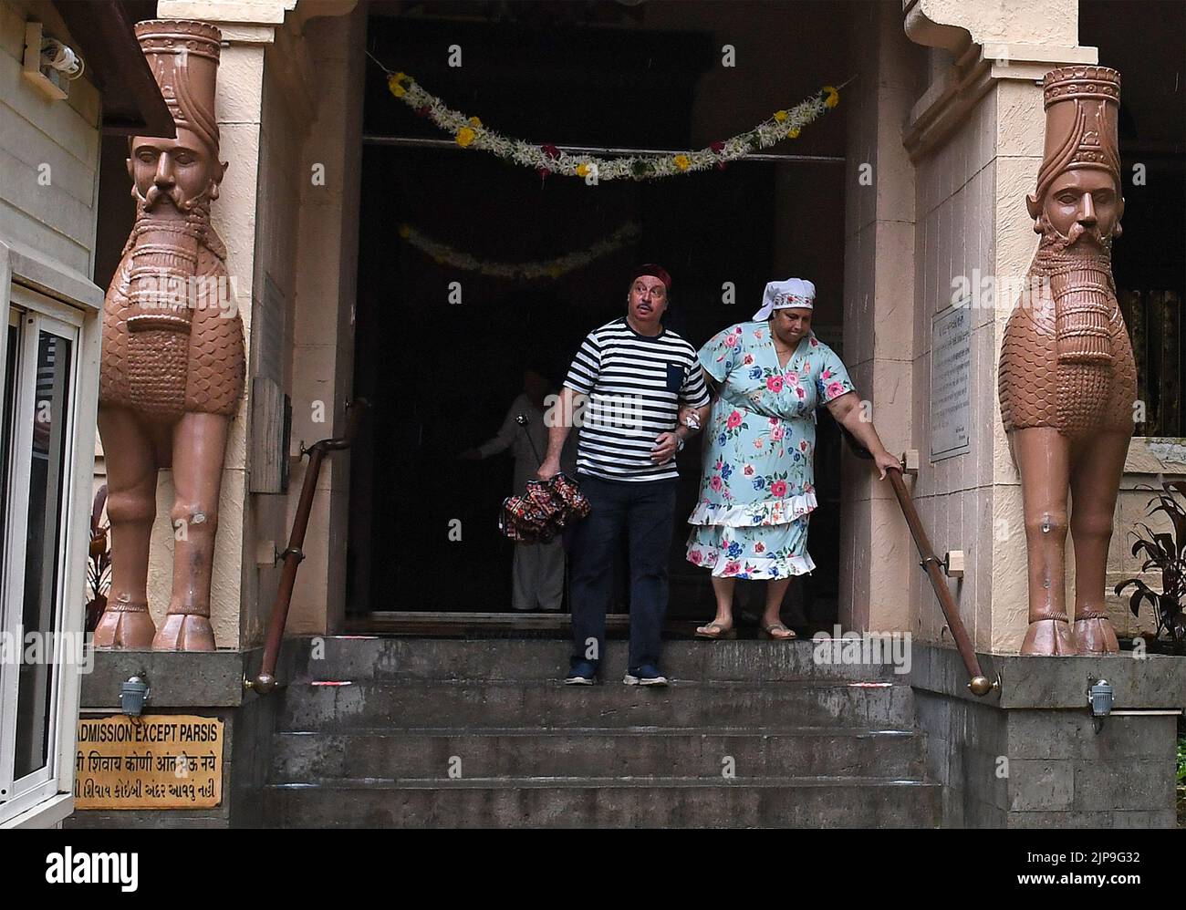 Parsis are seen coming out of Agiary (fire temple) during the ...
