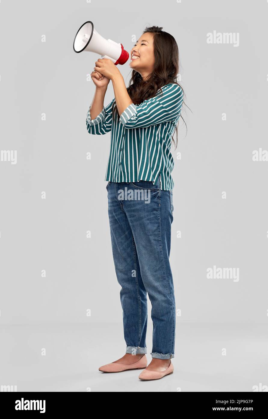 Asian woman megaphone protest hi-res stock photography and images - Alamy