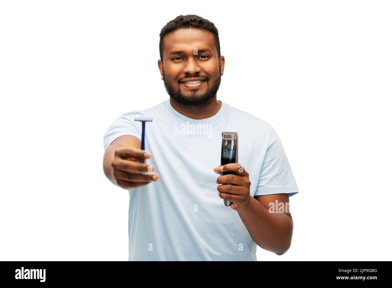 smiling african man with razor blade and trimmer Stock Photo - Alamy