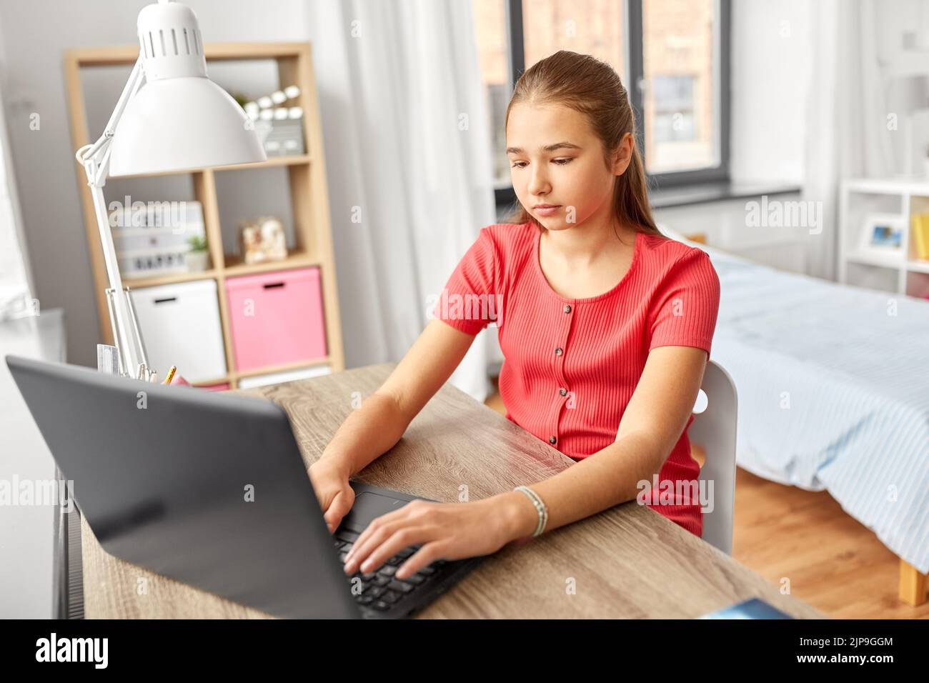 student girl with laptop computer learning at home Stock Photo - Alamy
