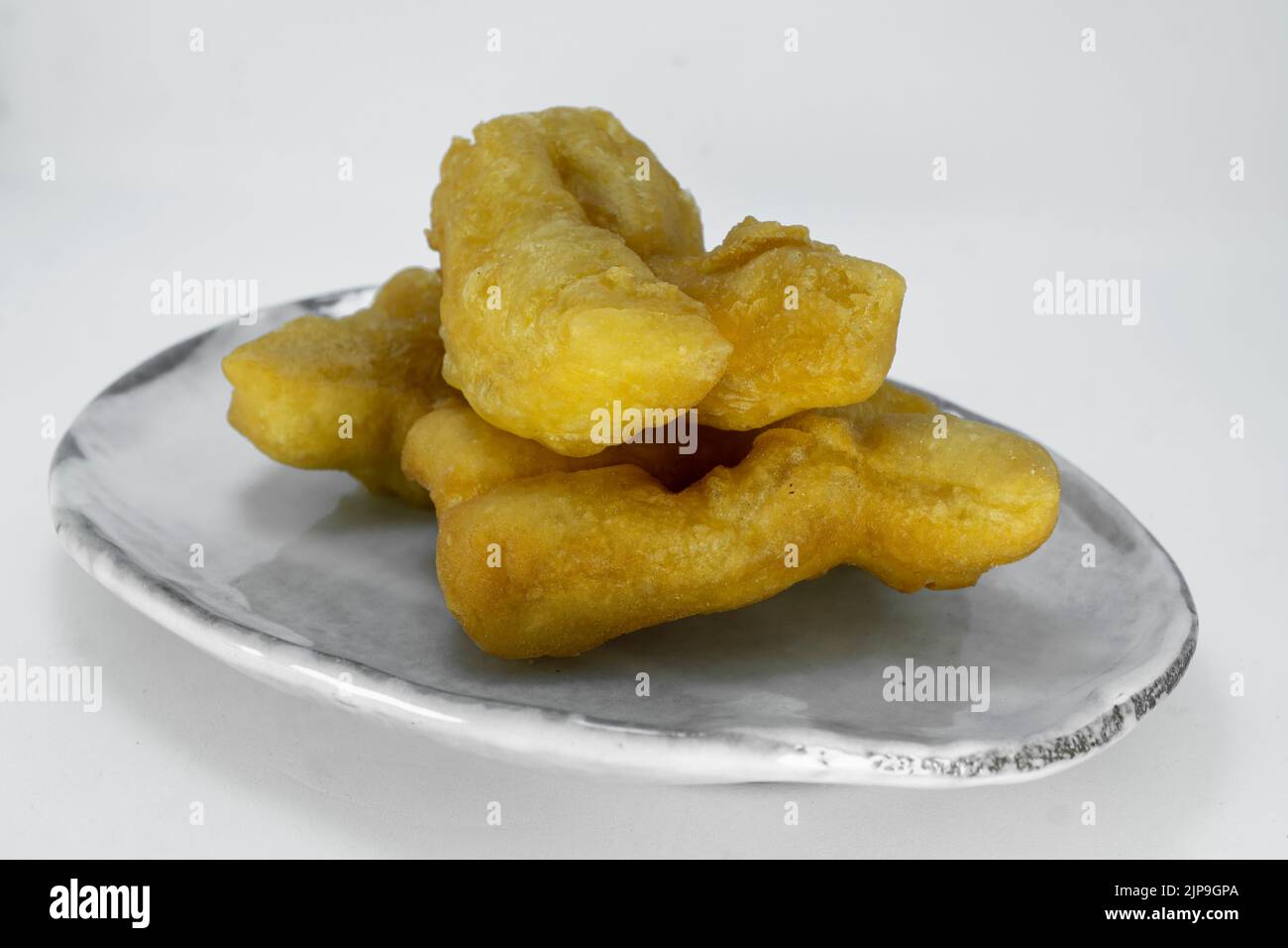 Pa Thong Ko in a Japanes plate isolated on white background. Pa Thong ...