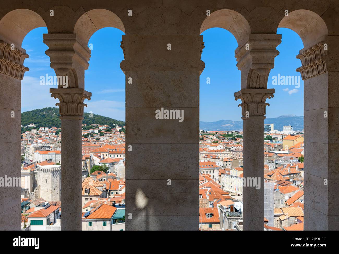 The cityscape of Split with red-roofed buildings, captured through the ...