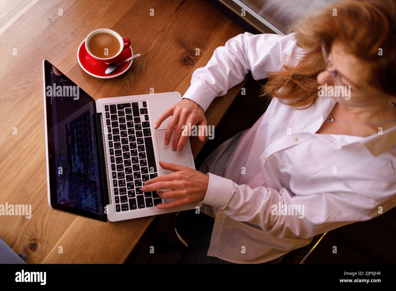 Young woman coding hi-res stock photography and images - Alamy