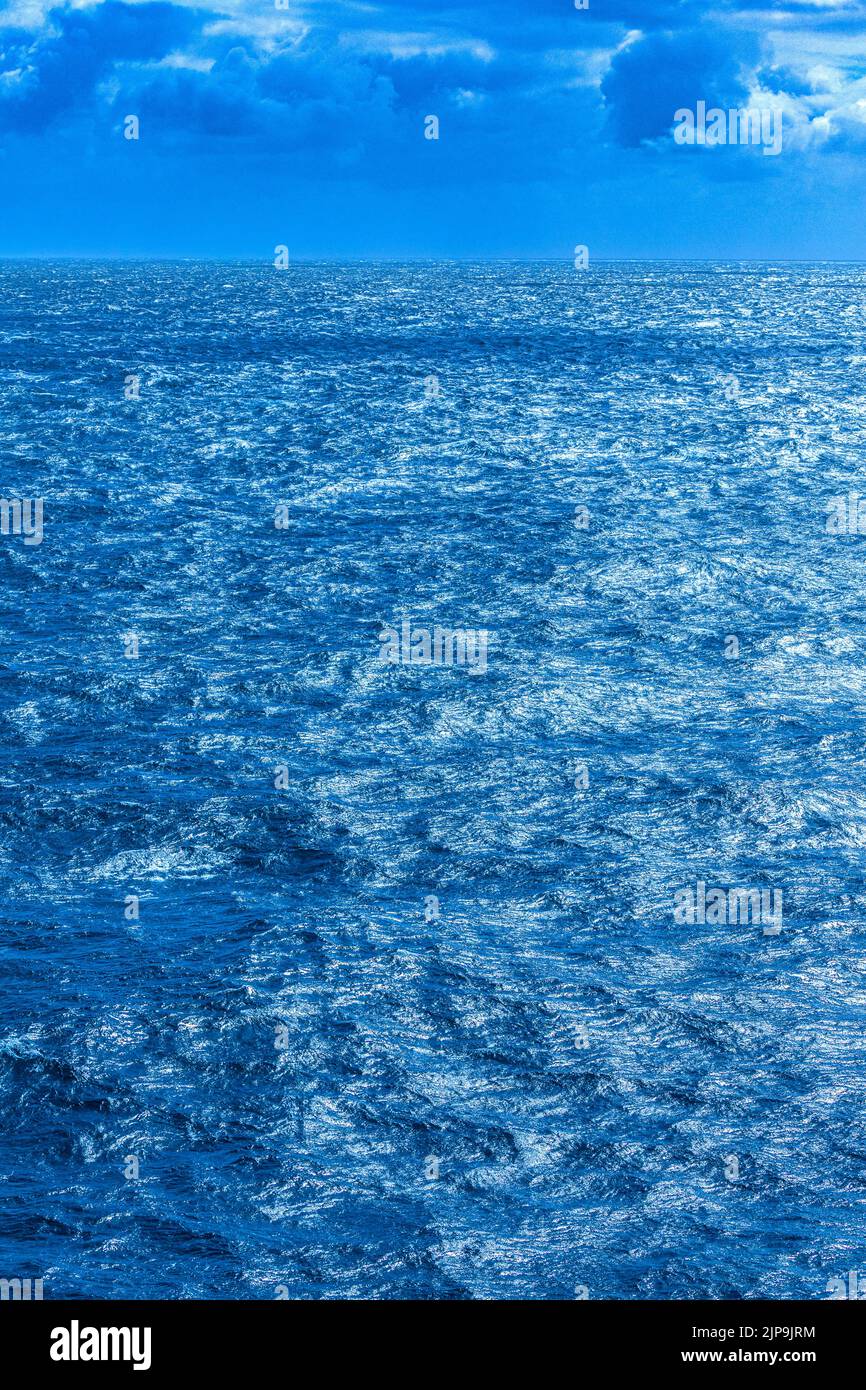 Cloudscape over choppy seas in the North Sea off the coast of Denmark ...