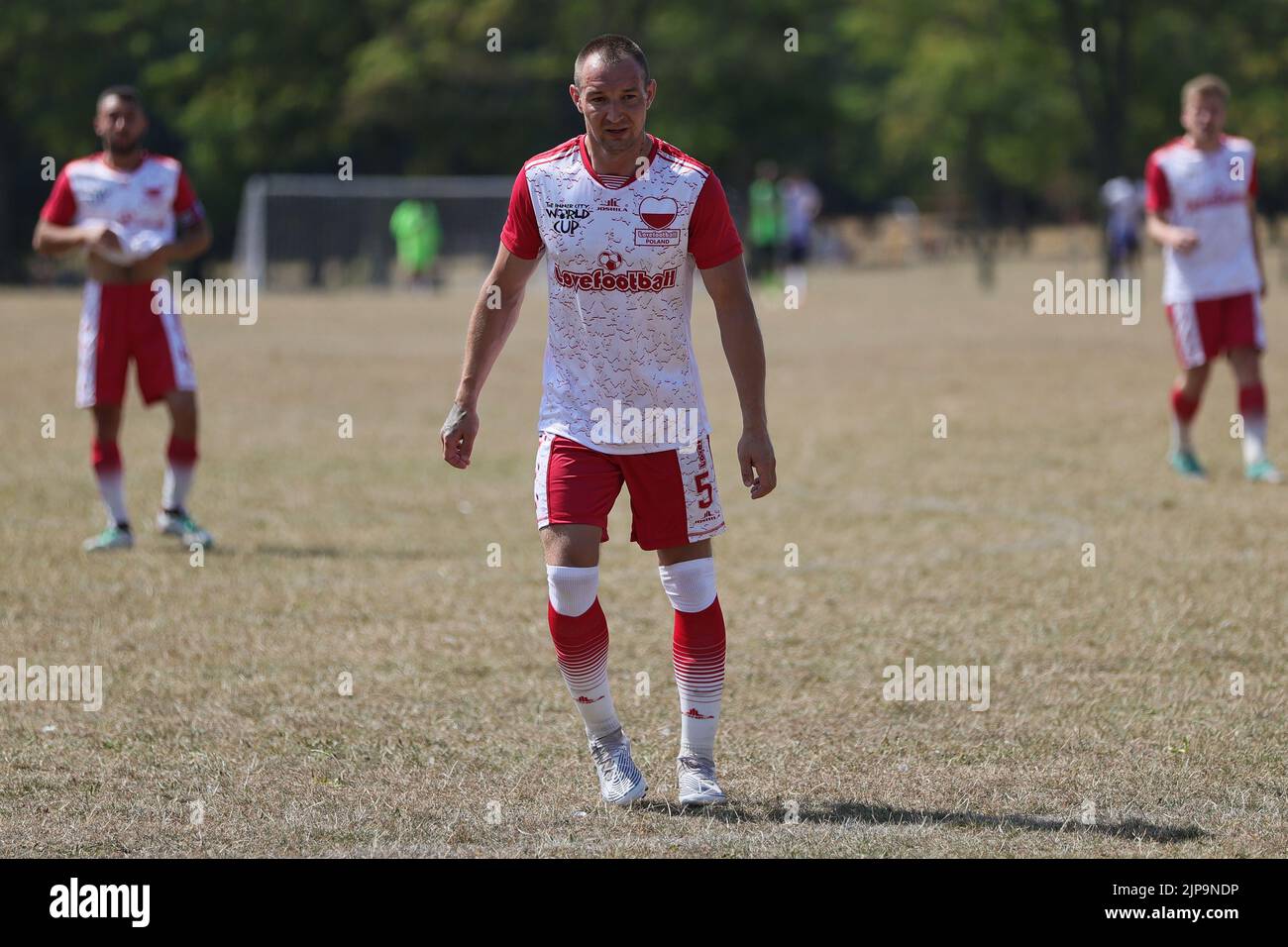 A Polish player looks on during an intercity world cup match against ...