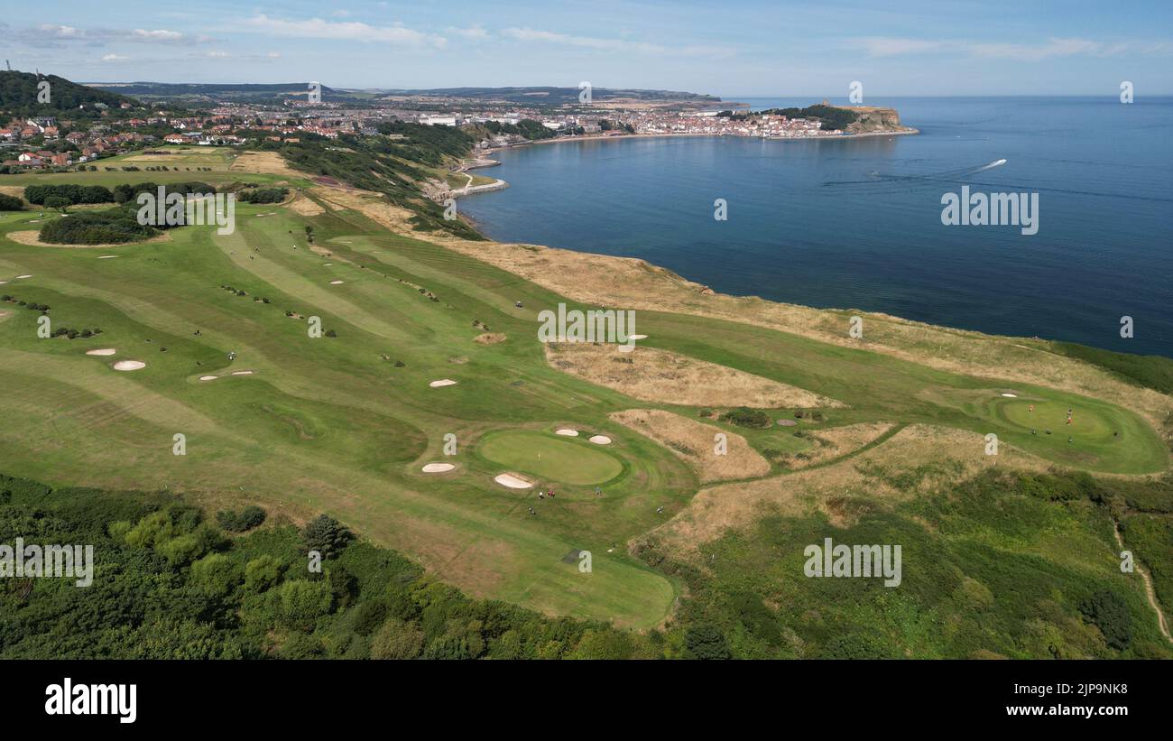 An aerial view of gold course surrounded by water towards Scarborough ...