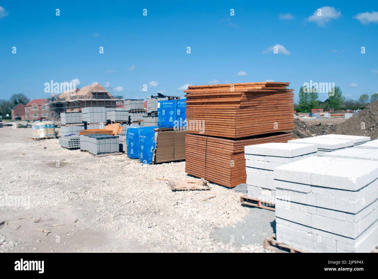 Stacked pallets of building materials on a building site Stock Photo ...
